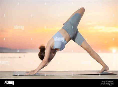 Active Woman Take Care Of Physical Health And Practice Yoga Perform