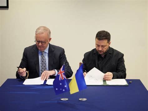 Aus Slaps Sanctions On Russia Inks Ukraine Pact