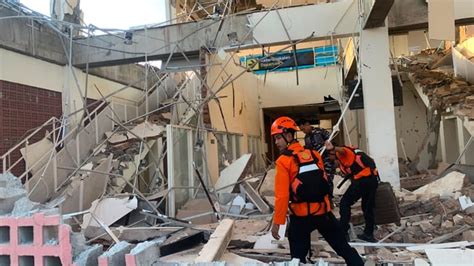 Rescuers Dig Through Rubble And Landslides After Indonesia Quake Kills