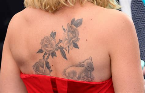 Scarlett Johansson Reveals Her Extensive Back Tattoos In A Striking Red