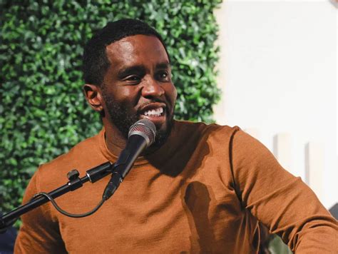 Diddy Walks Prison Yard As Release Date Moves Up