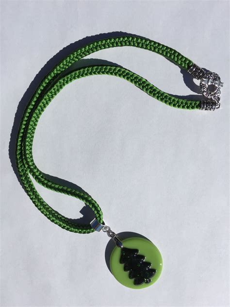 Square Rattail Braid Adorning A Glass By Grace Tree Pendant And