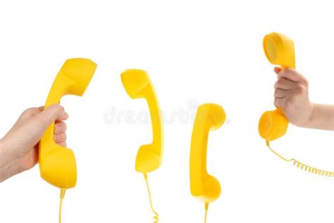 Yellow Handset In Woman Hand Isolated On White Copy Space Stock Image