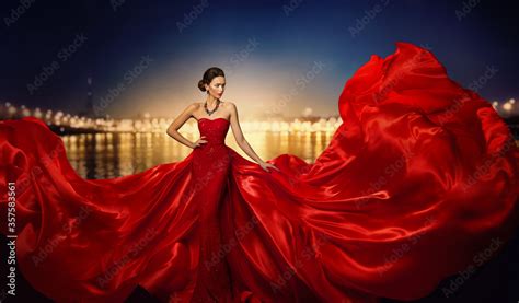 Fashion Model In Fluttering Dress In Night City Street Lights Elegant