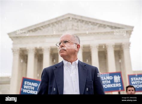Plaintiff Mark Janus Stands Outside The Supreme Court After The Court
