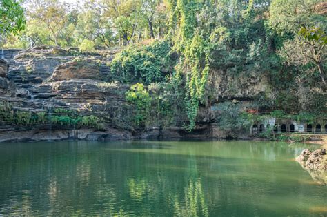A Waterfall Over Bedrock In Nature With Rocks And Water Chachai