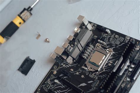 Engineer Plugging Cpu Microprocessor To Motherboard Socket Computer Technology Hardware