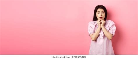 Timid Smiling Asian Woman Candid Over 9 Royalty Free Licensable Stock