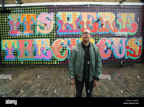 Street Artist Ben Eine Putting The Finishing Touches To His Work Its