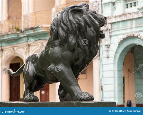 Side View Of A Old Lion Bronze Statue On The Prado Promenade Stock