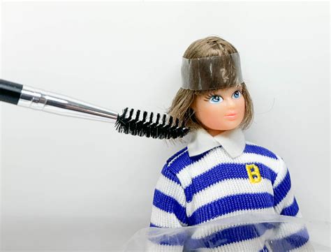 Dusting Brushes For Flocked And Haired Models With One Stiff Bristle