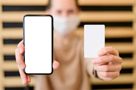 Free Photo Close Up Woman Holding Mobile Phone And Card