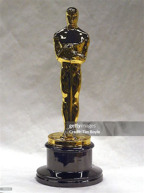 An Oscar Statue Made For The Academy Awards Is Displayed At The Rs