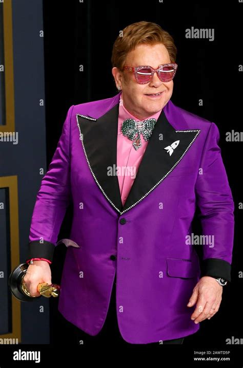 Hollywood Ca February 9 Elton John Poses In The Press Room During