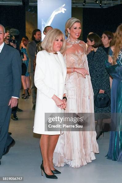 Brigitte Macron And Queen Maxima Of The Netherlands Attend The Iris News Photo Getty Images