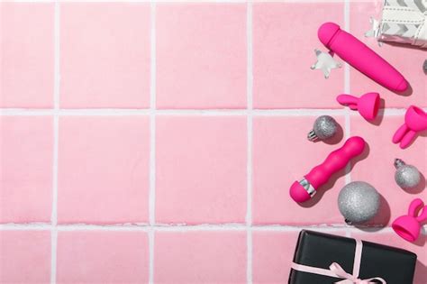 Premium Photo Sex Toys With Christmas Ts On The Background