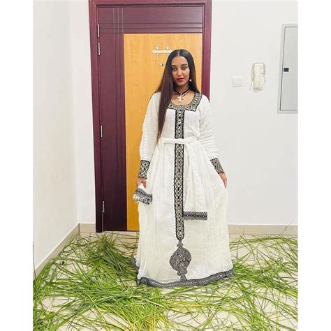 Elegant And Modern Habesha Clothing With Menen Fabric Simple Tilf Des