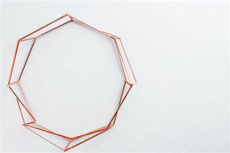 Unique Geometric Copper Structure Set Against A Minimalist Background On A Bright Surface During