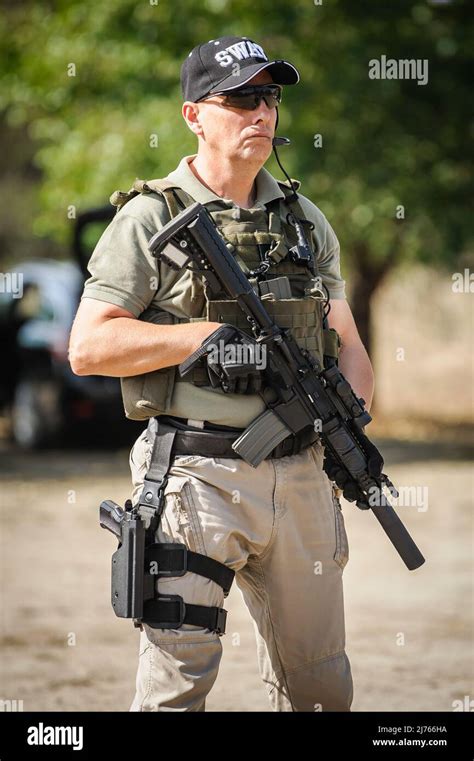 Full Armed Swat Special Forces Army Soldier In Combat Camouflage
