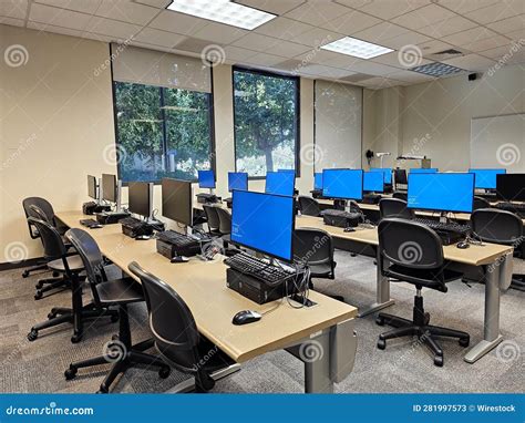 Modern Classroom With Computer Monitors Situated On Desks Stock Image Image Of Computers
