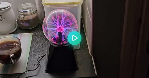 The Electromagnetic Field From A Plasma Ball Causing A Strip Light