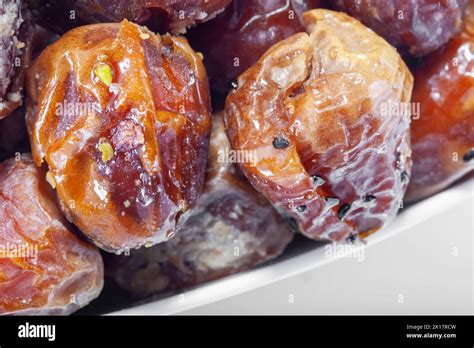 Traditional Arabic Sukari Dates Close Up With Nuts And Arab Herbs Full