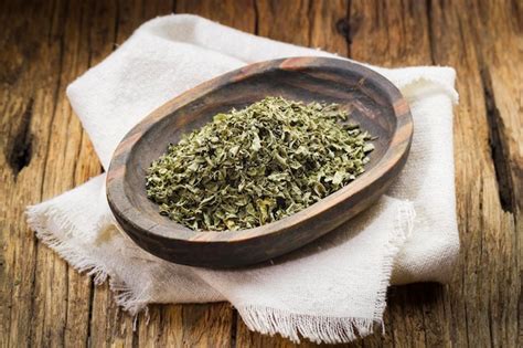 Premium Photo Dried Moringa Leaves In Wooden Container Medicinal Plant