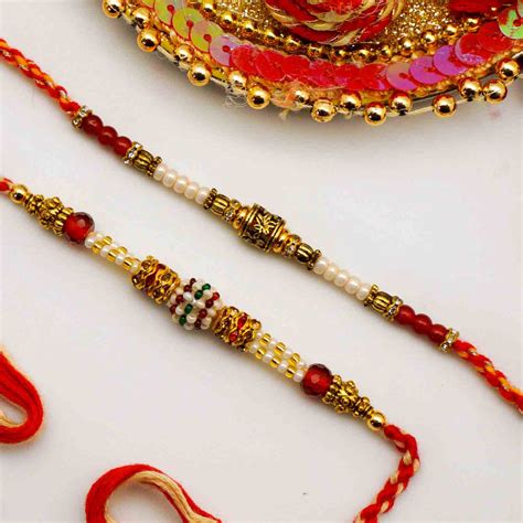 Pearly Rakhi Set With Gulabjamun And Rasgulla
