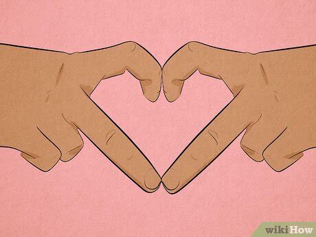 Heart Hands 🫶 Meaning And 3 Ways To Do The Gesture