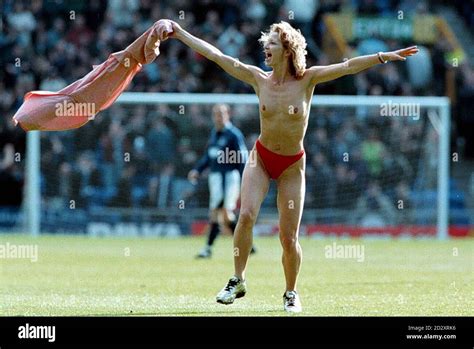 A Streaker Runs Onto The Pitch At Goodison Park During The Interval Of