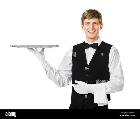 Portrait Of Young Handsome Waiter Holding Empty Tray Isolated On White