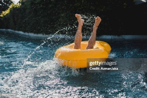 People Falling Into Swimming Pool Photos And Premium High Res Pictures