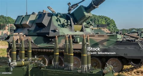 Guided 155 Mm Artillery Ammunition On A Howitzer Battle Position Stock