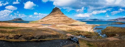 Stunning Aerial View Of Kirkjufell Mountain In Iceland With Cascading