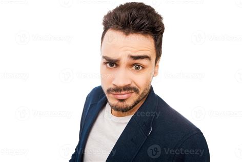 Feeling Confused Confused Young Man Making A Face And Looking At