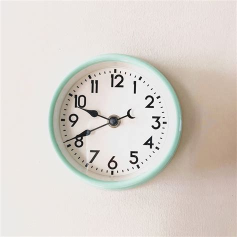 Download Light Blue Wall Clock Wallpaper