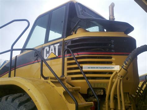 Caterpillar 740 Articulated Truck With Tailgate