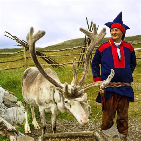 Deer And Reindeer Breeder Dressed In National Clothes The Sami In