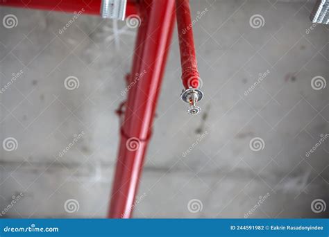 Close Up Fire Sprinkler On The Ceiling For Fire Detection And Alarm