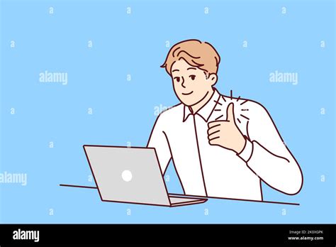 Happy Young Businessman Sit At Desk Work On Laptop Show Thumb Up