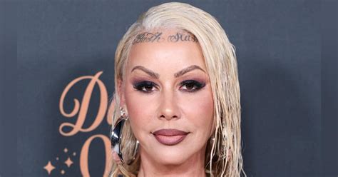 Amber Rose Looks Completely Unrecognizable With Long Hair Photos