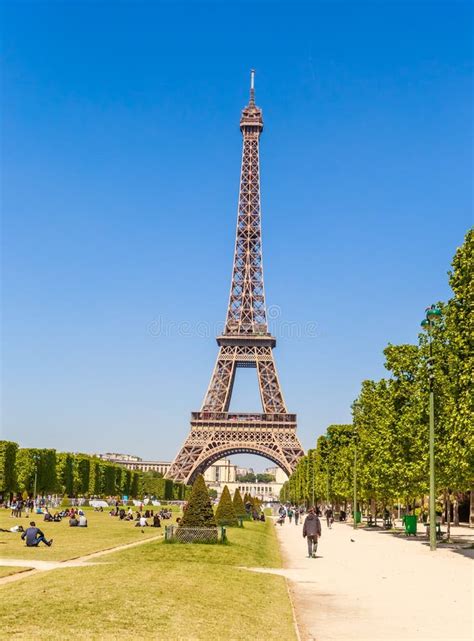 Eiffel Tower In Paris With Grass Lawn And People Paris Editorial