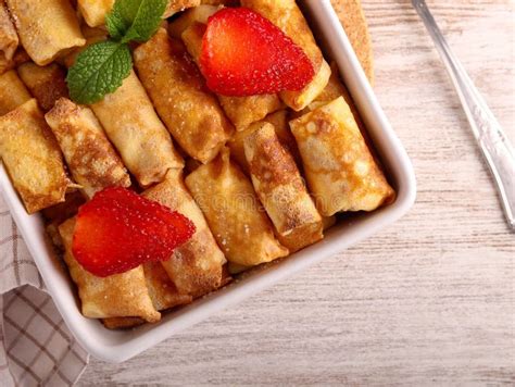 Baked Mini Crepes Rolls Filled With Cheese Stock Image Image Of Food Sweet 311181827