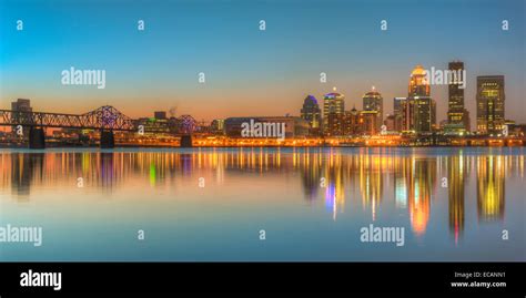 The Skyline Of Louisville Kentucky Including The Second Street Bridge Reflects Off The Ohio