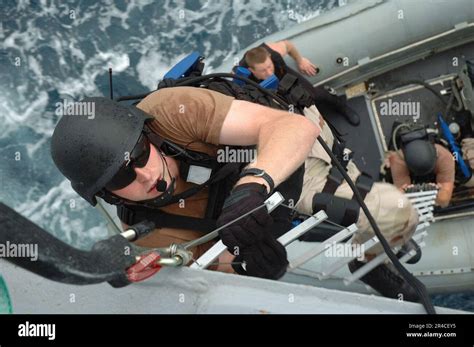 Us Navy Fire Controlman 3rd Class Successfully Climbs The Hook And Pull Assembly Aboard The