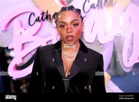 Rita Bernard Shaw Poses For Photographers Upon Arrival For The Uk