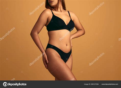 Unrecognizable Fit Young Female Model Black Underwear Standing Hand