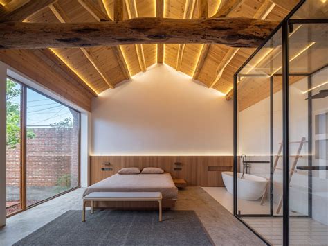 Arch Studio Extends Mixed House In China Beneath Wave Like Roof