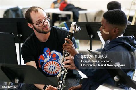 Band Instructor Benjamin Koscielak Works With Khalil Coldpepper And