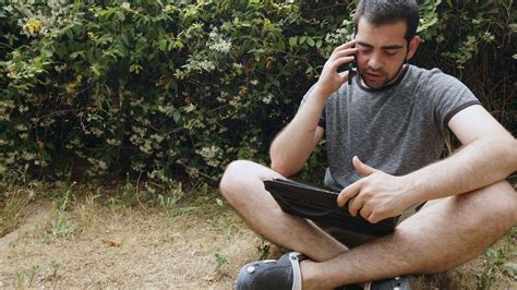 Young Man Talking With Cellphone In Nature Outdoor Concept 8100212 Stock Video At Vecteezy
